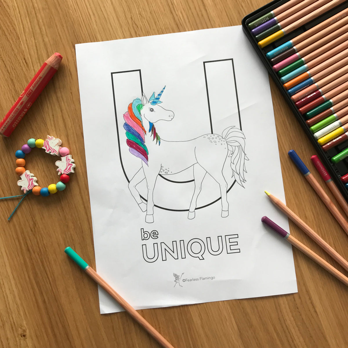 'be Unique' free colouring in download– Fearless Flamingo